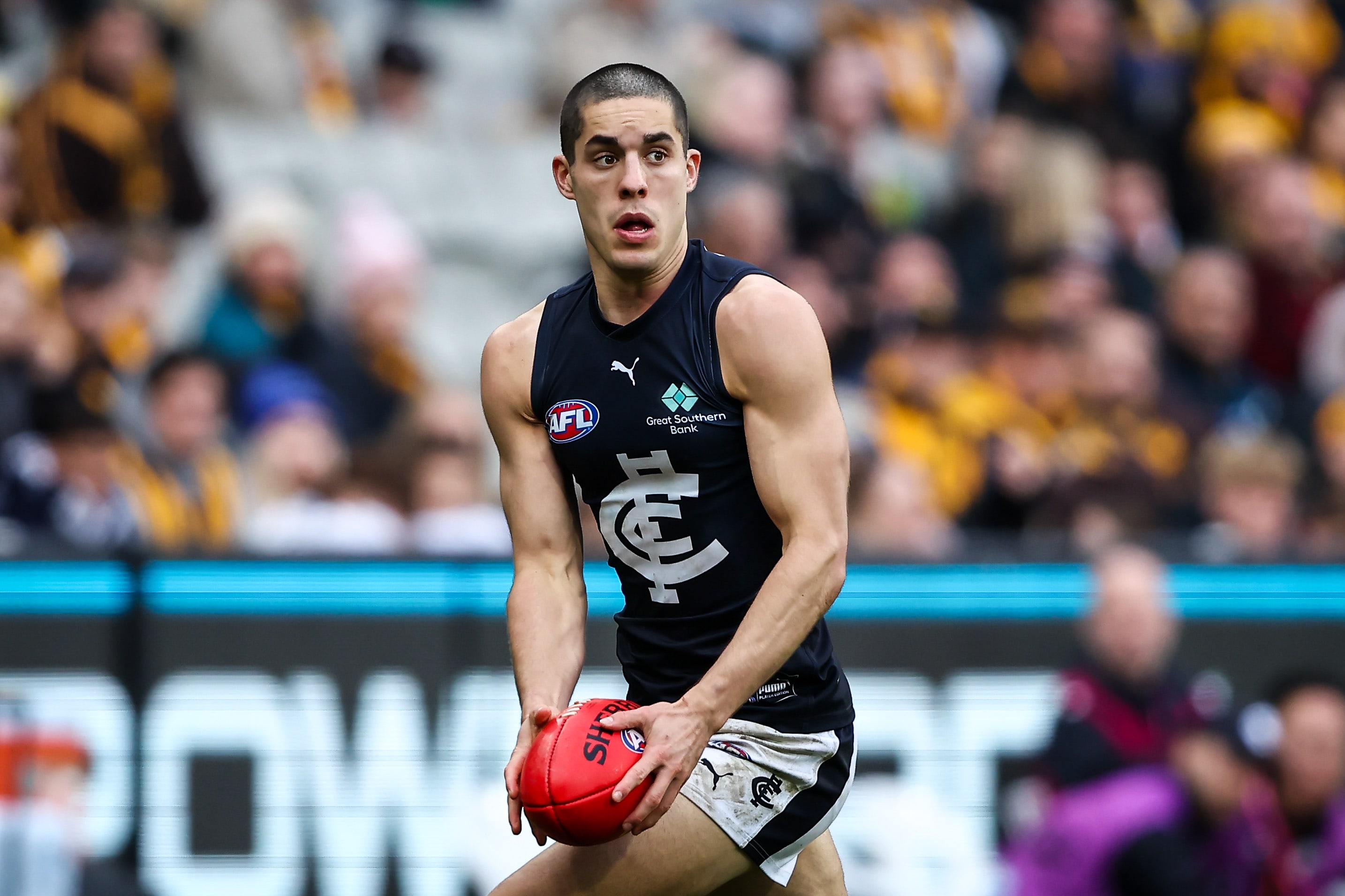 AFL squad selection: Key midfielders named, Docherty out