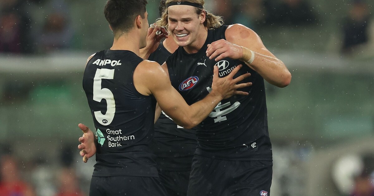 AFL match report: Carlton holds on for crucial win